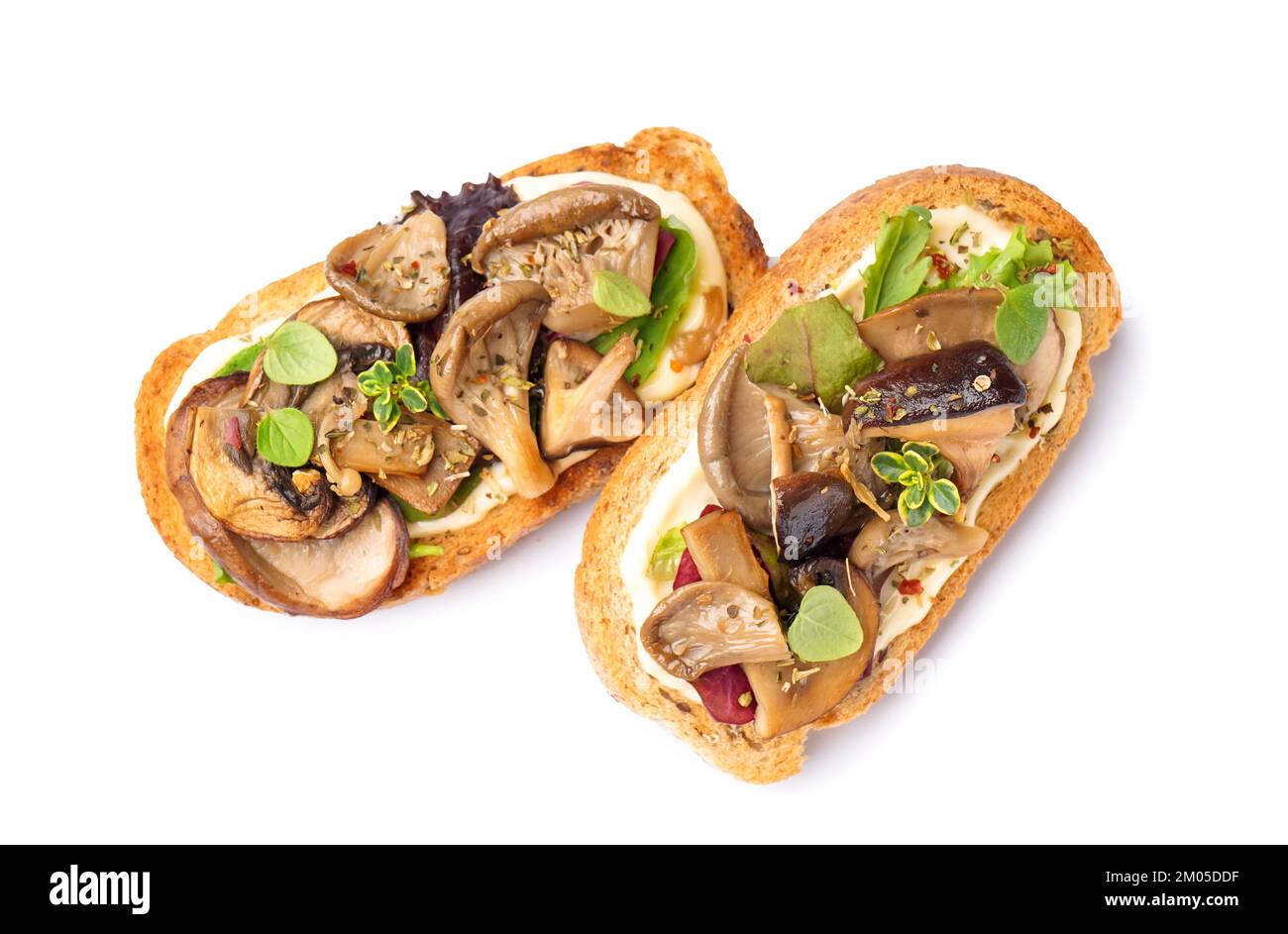 Tasty toasts with cream cheese and mushrooms on white background Stock ...