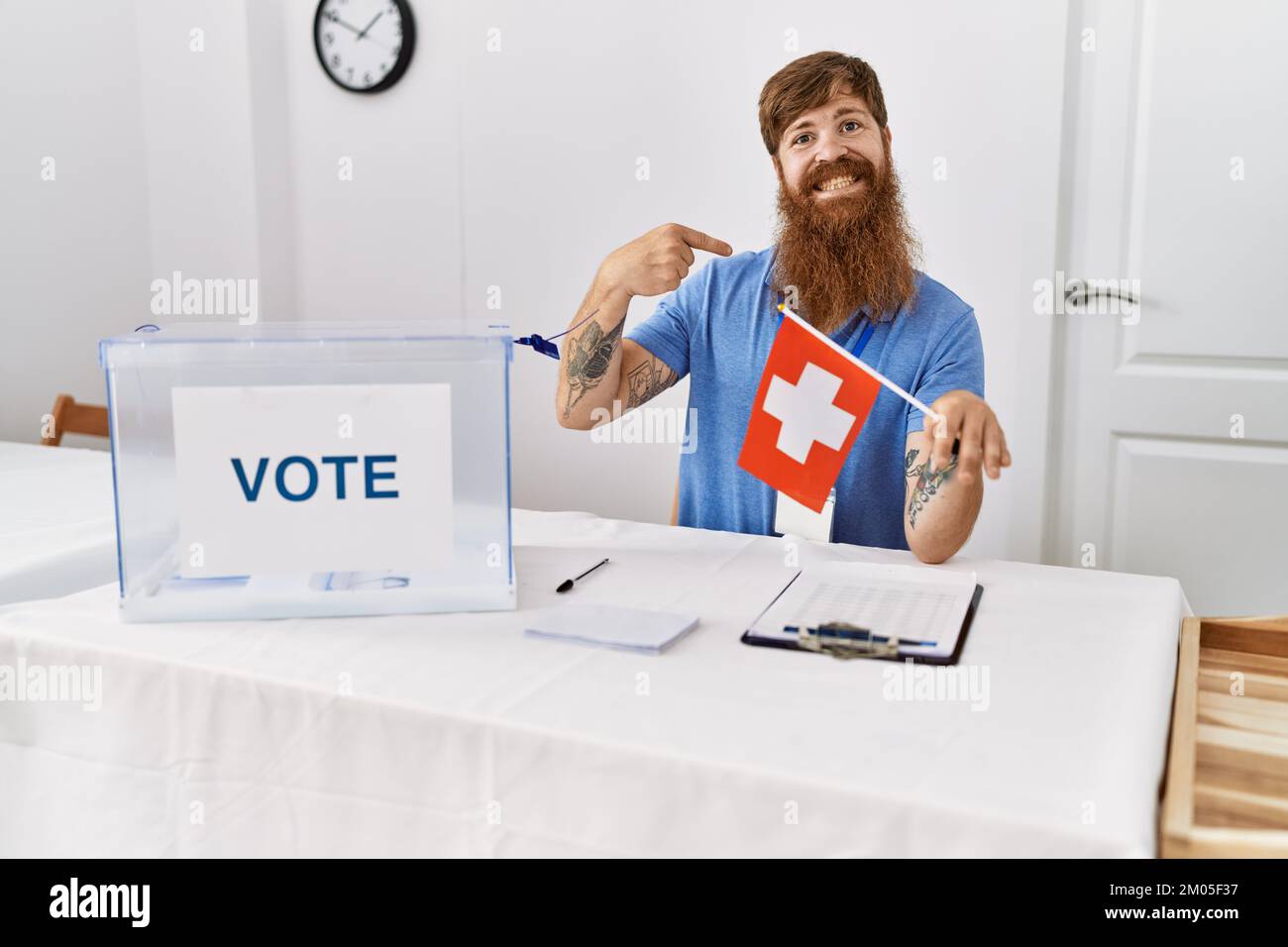 Caucasian man with long beard at political campaign election holding ...