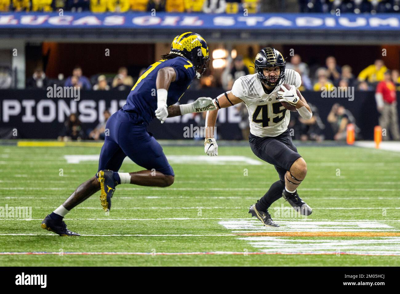 Indianapolis, Indiana, USA. 03rd Dec, 2022. Purdue running back Devin ...