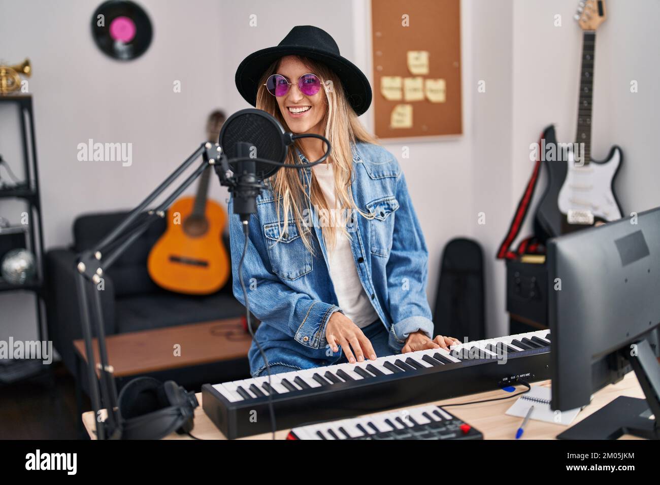 Young blonde musician keyboard hi-res stock photography and images - Alamy