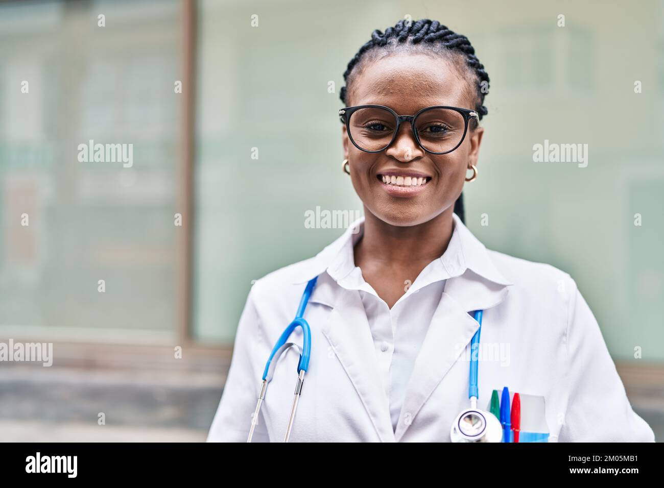 African american woman doctor smiling confident standing at hospital ...
