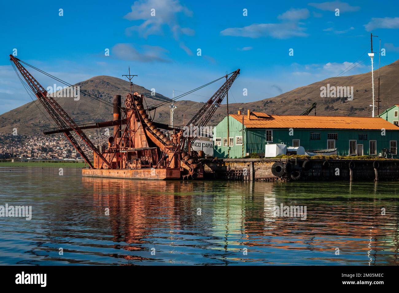 Old and rusty dredge in Puerto Muelle, Lake Titicaca, Puno, Bolivia ...