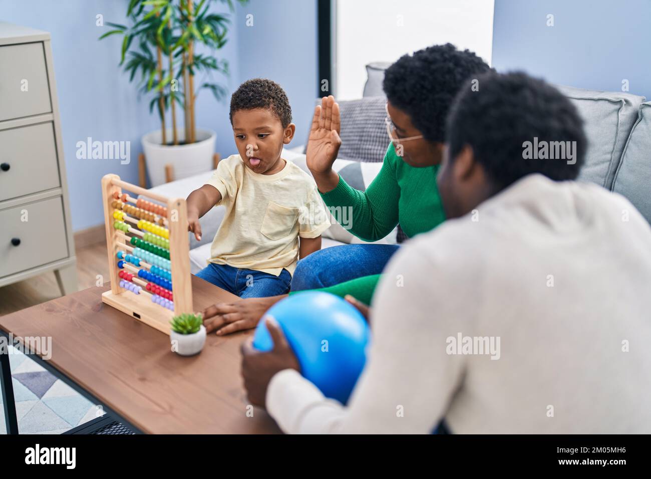 African american family playing with abacus at home Stock Photo - Alamy