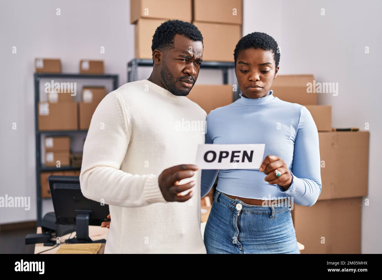 Young african american couple working at small business ecommerce ...