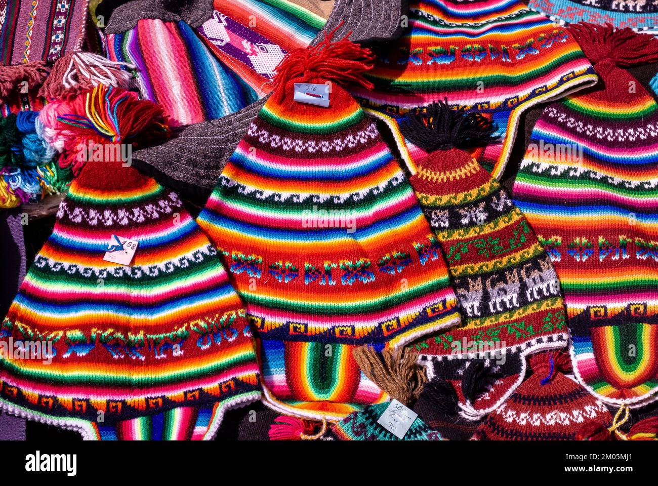 Handicrafts and peruvian flags at Chivay's street market, Peru Stock ...
