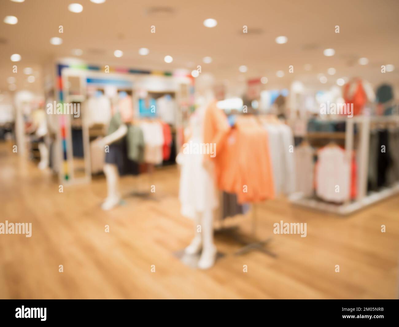 blur clothing store background in shopping mall Stock Photo - Alamy