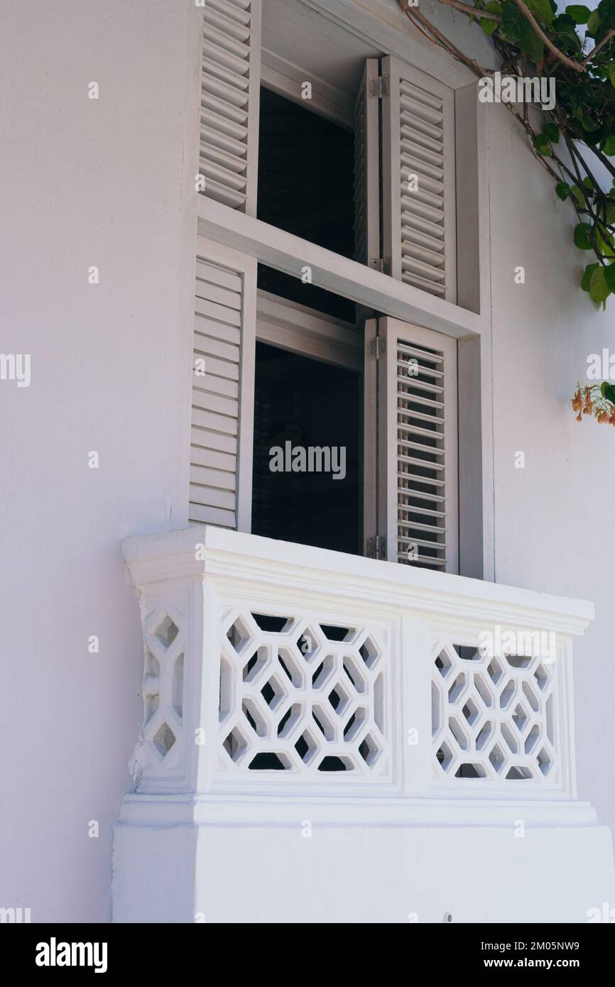 Old colonial balcony in a historic white building in Cartagena ...