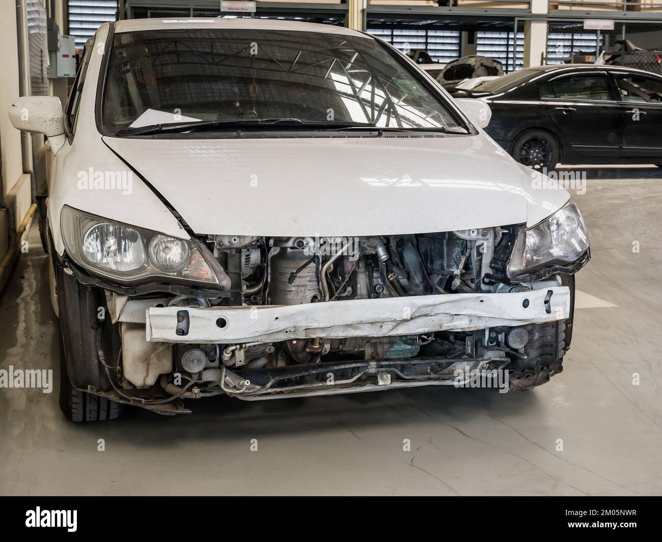 damaged accident car waiting for repair in the car repair garage Stock ...