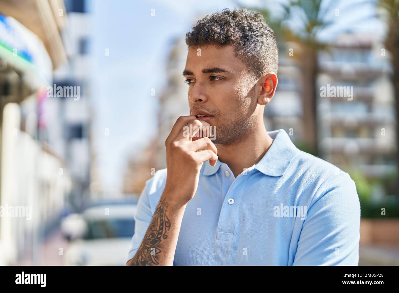 African american man standing with doubt expression at street Stock ...