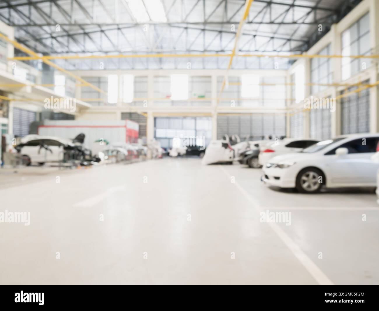 Car repair service centre interior blurred background Stock Photo - Alamy