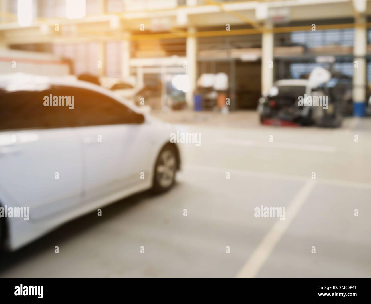 Car repair service centre interior blurred background Stock Photo - Alamy