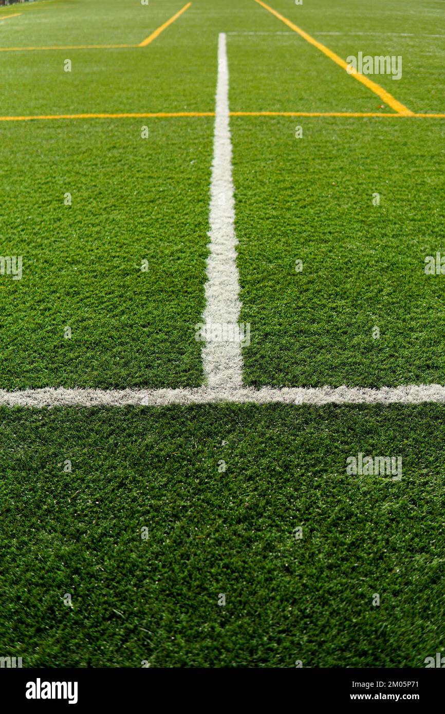 Close-up of white lines painted on artificial grass soccer field Stock ...