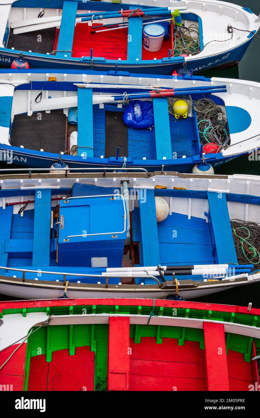 Colorful rowing dinghies in Luarca, Asturias Stock Photo - Alamy