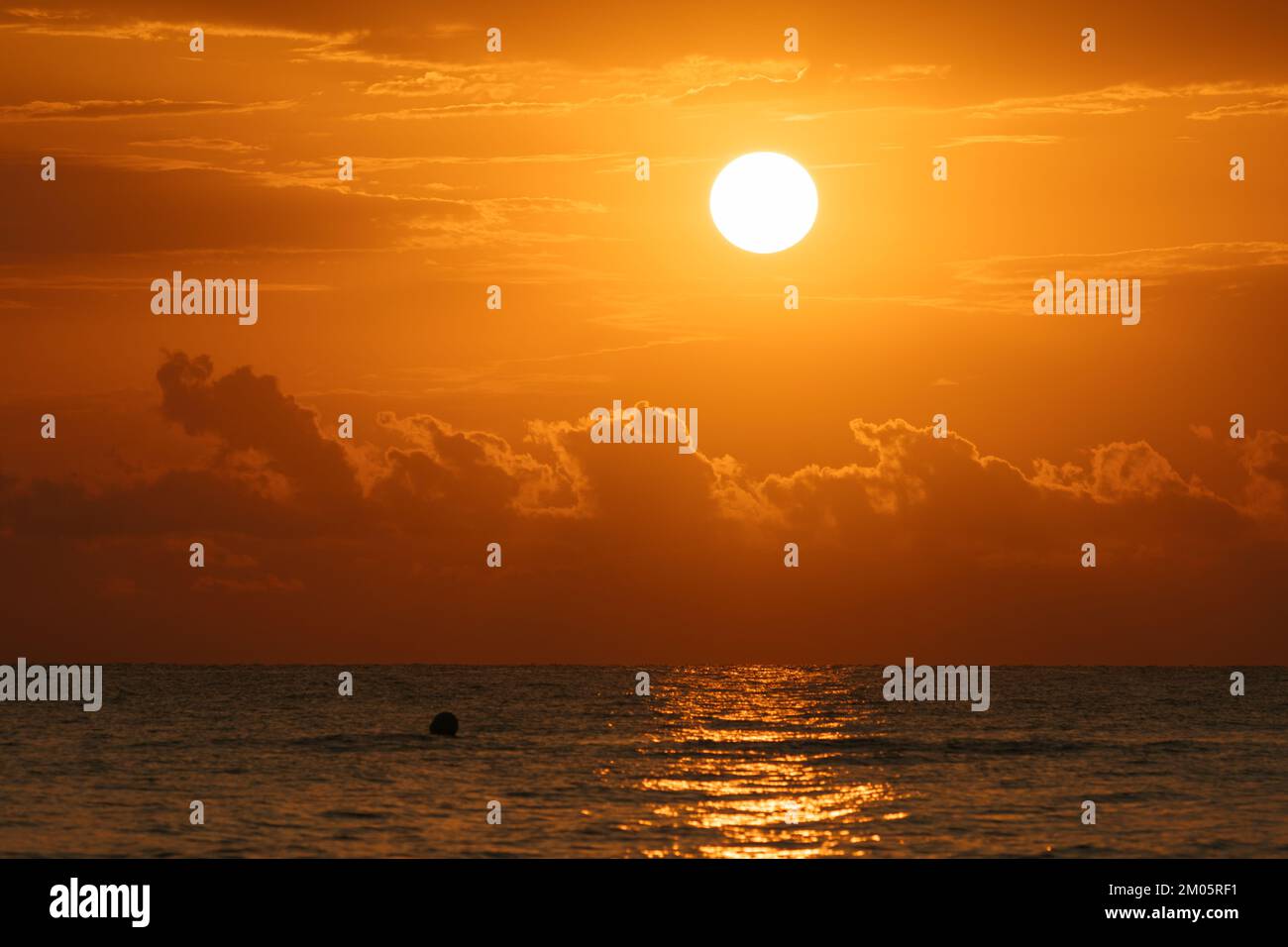 Bright dramatic orange sunrise over Mediterranean sea. Oliva, Valencia ...