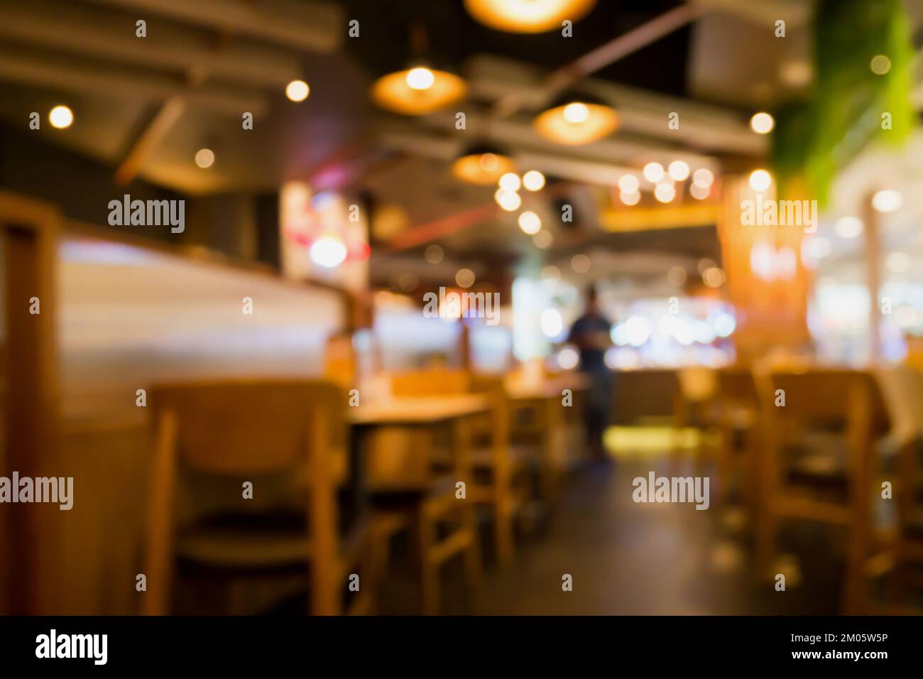 Restaurant cafe interior abstract blur background with bokeh light ...