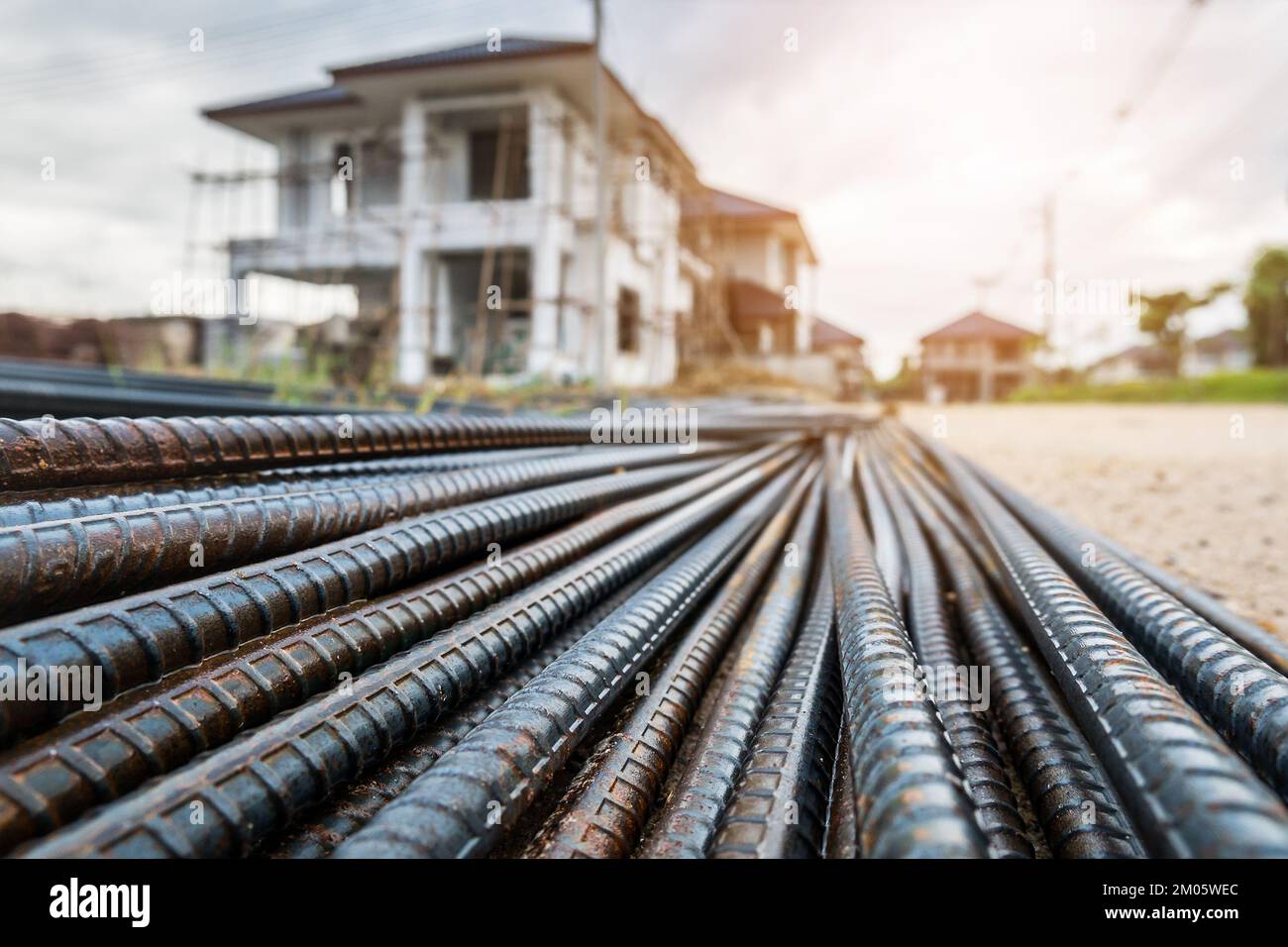 steel rebar for reinforcement concrete at construction site with house ...