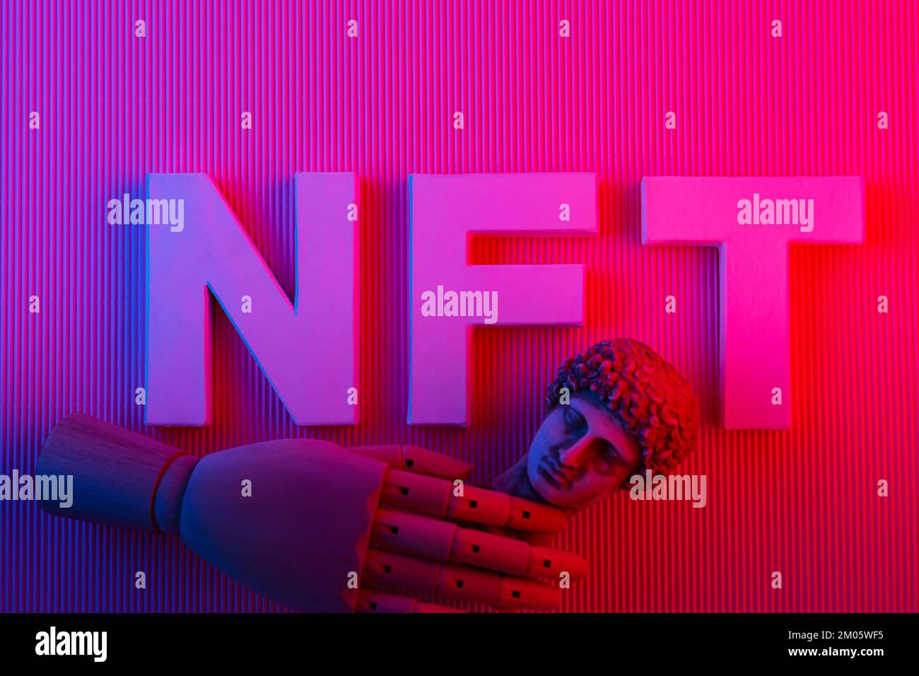 NFT non-fungible token on a bright pink neon background. NFT ...