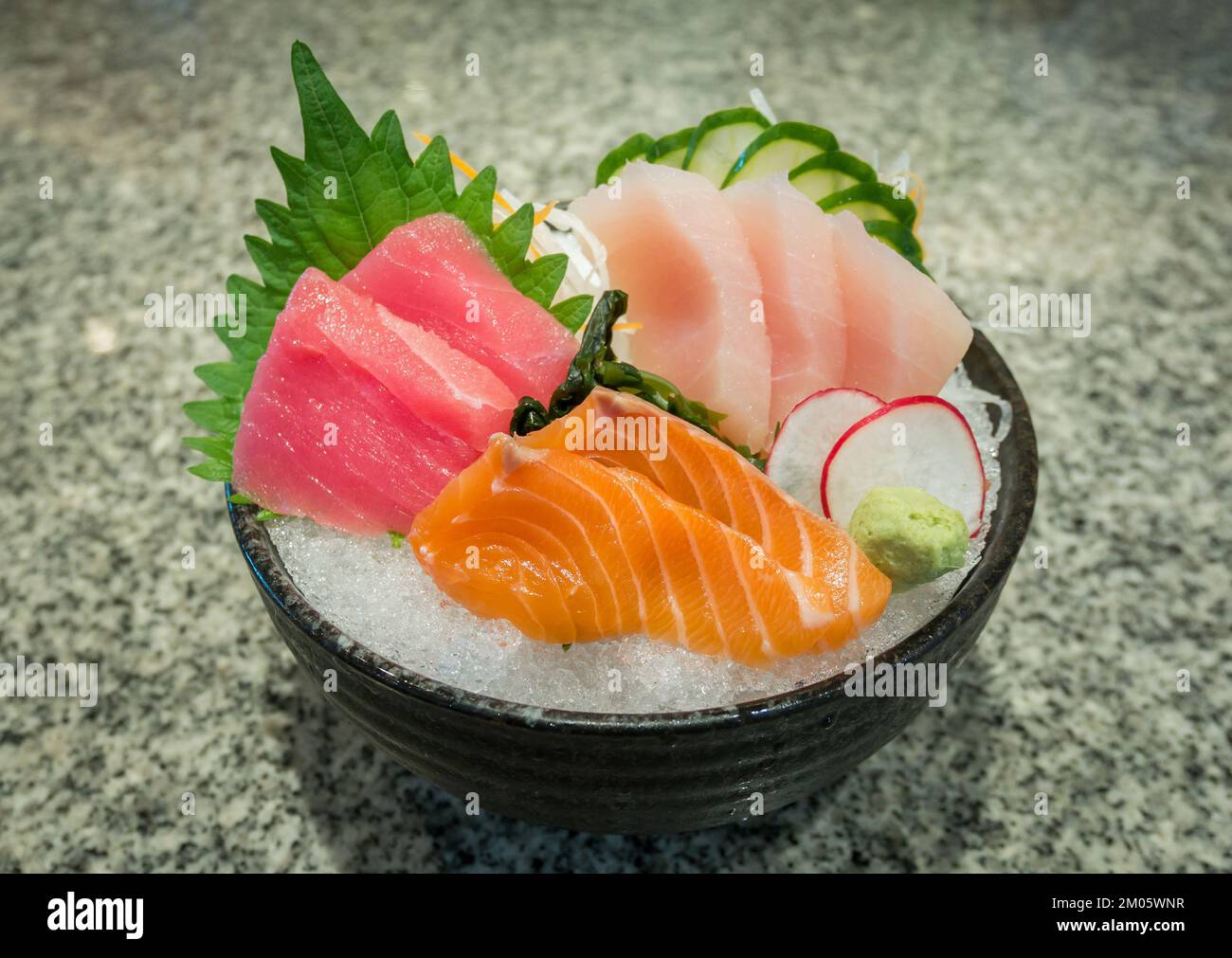 Sashimi set with salmon tuna on ice Stock Photo - Alamy