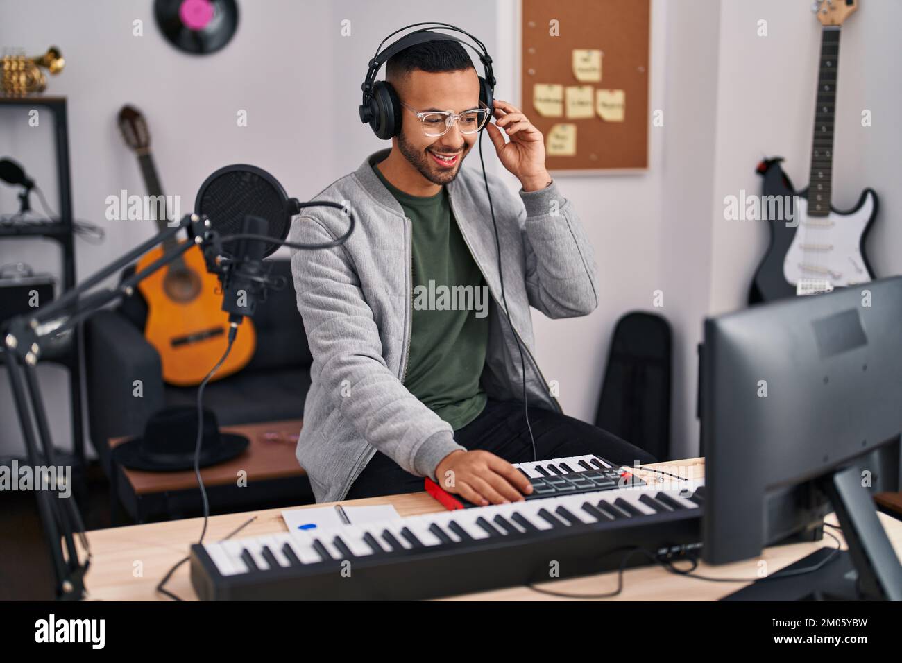 African american man musician having dj session at music studio Stock ...