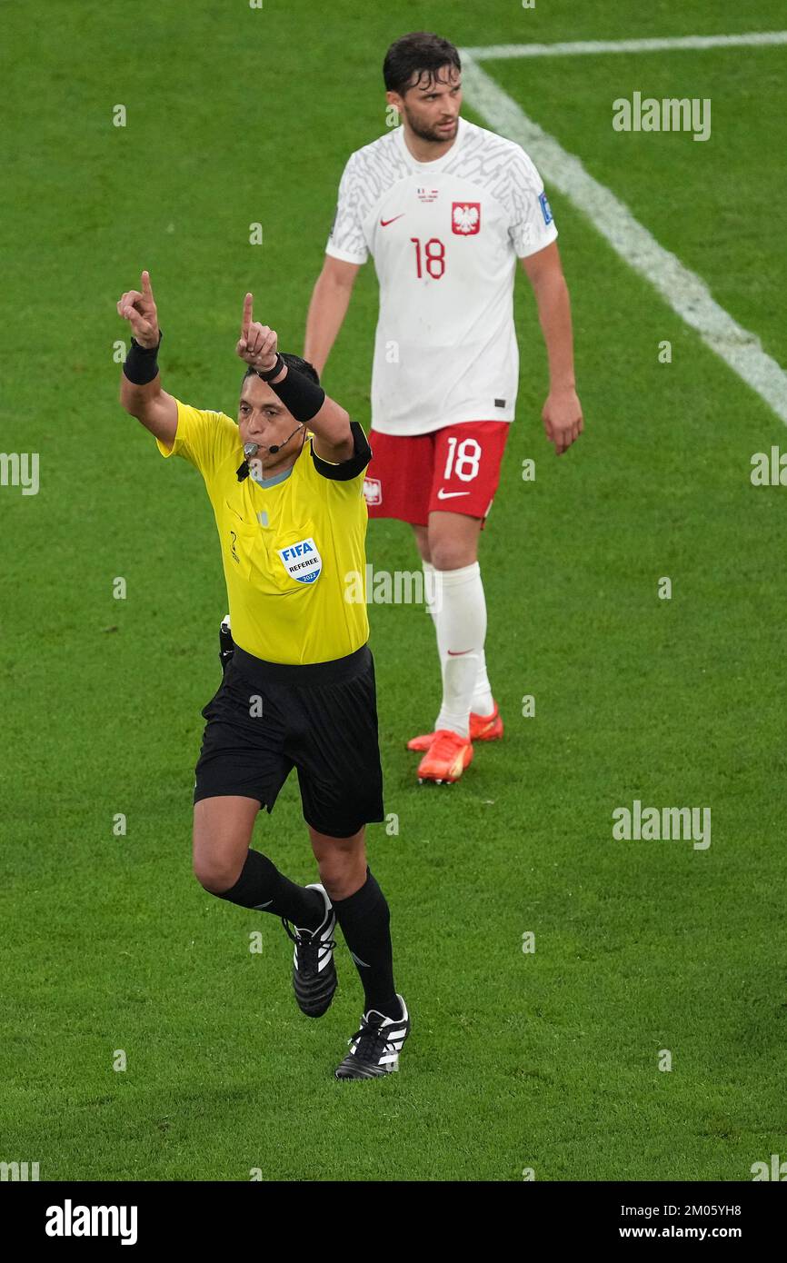 Doha, Qatar. 4th Dec, 2022. Referee Jesus Valenzuela Saez (L) gestures ...