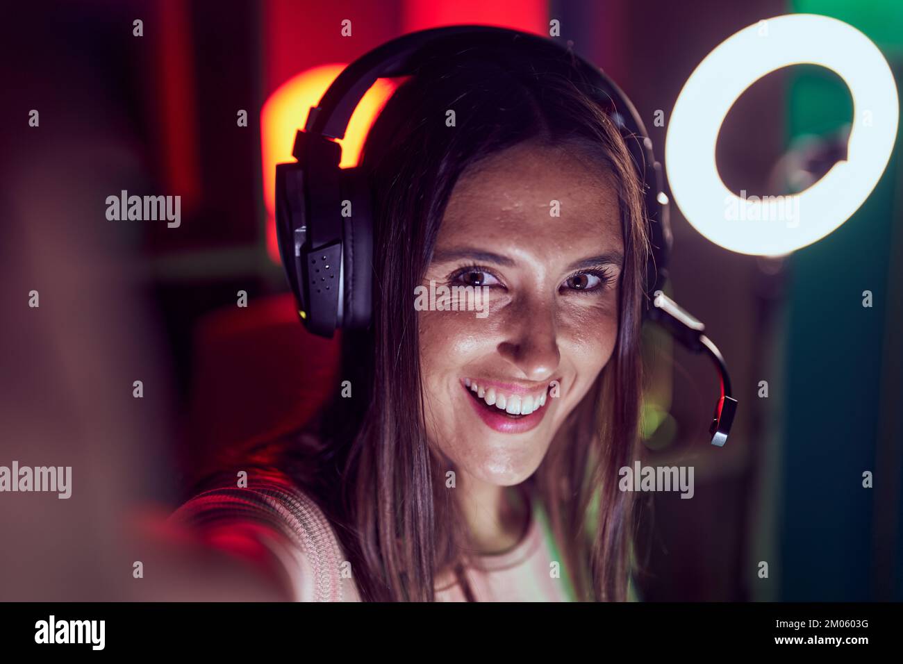 Young beautiful hispanic woman streamer smiling confident make selfie ...