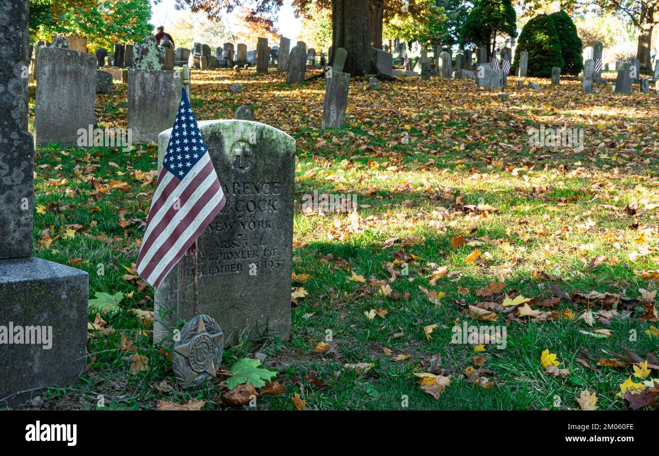 Close up of American flag next to the historic soldier gravestone in ...