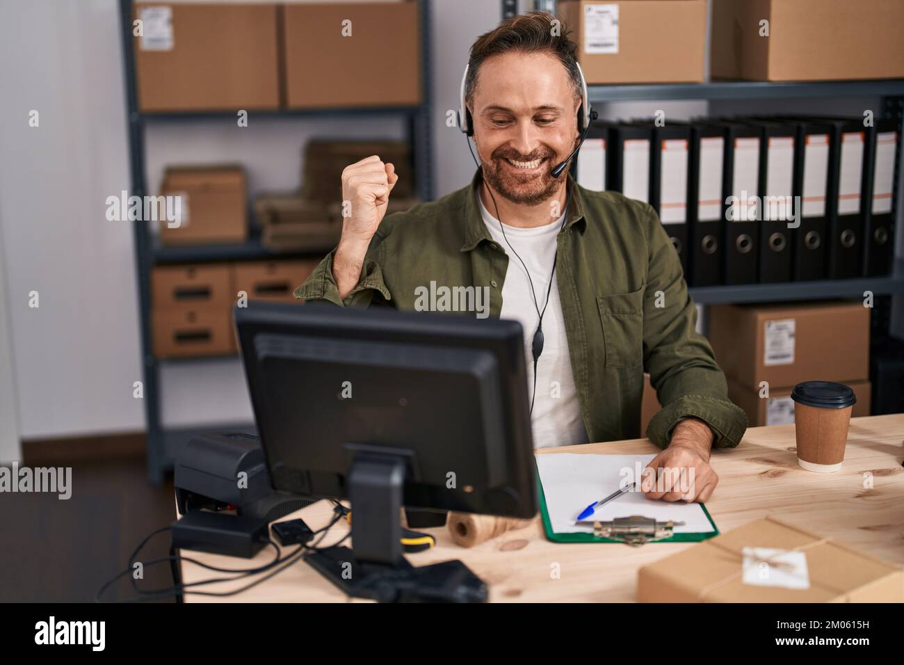 Middle age caucasian man working at small business ecommerce wearing ...