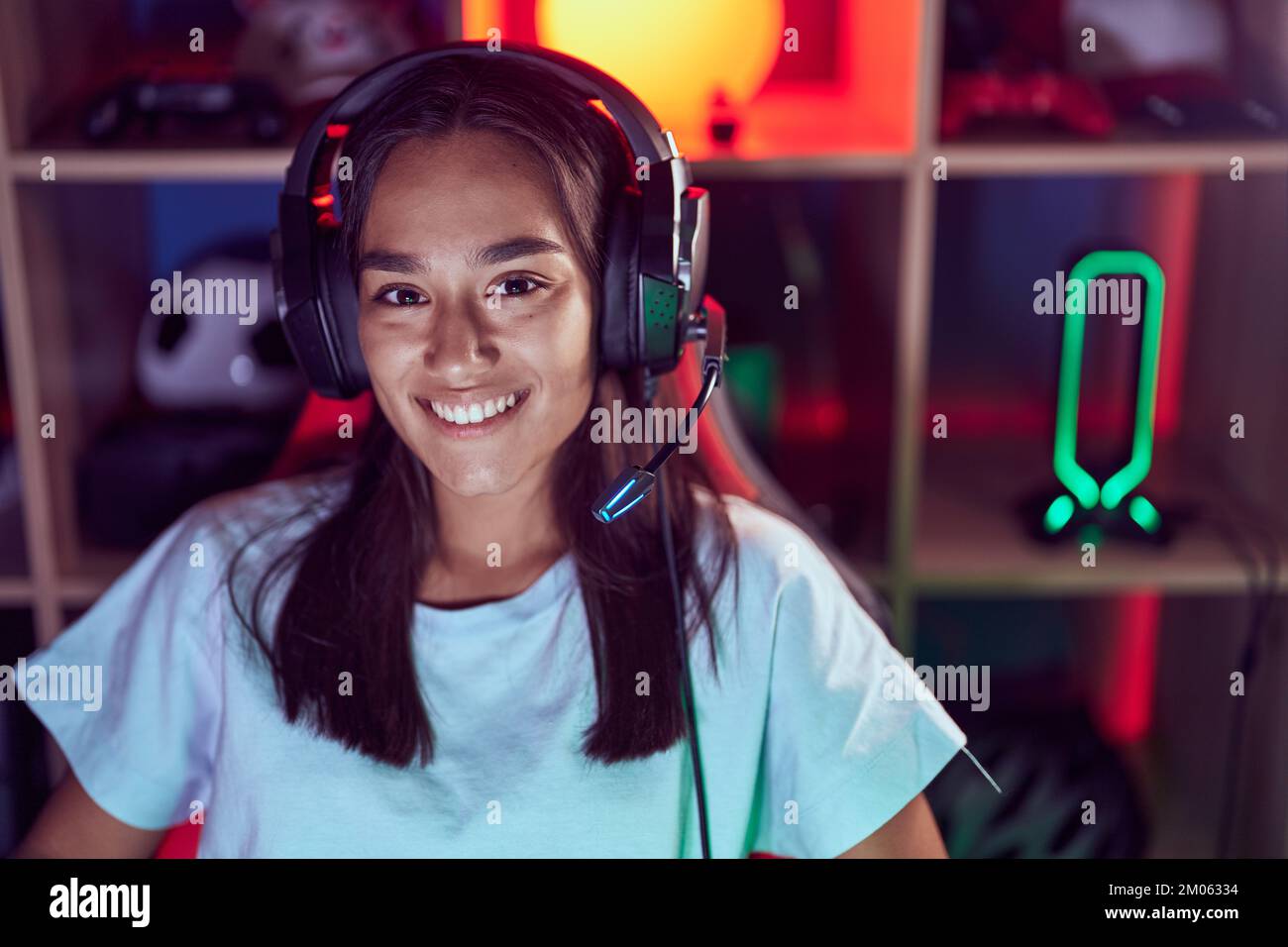 Young beautiful hispanic woman streamer smiling confident sitting on ...