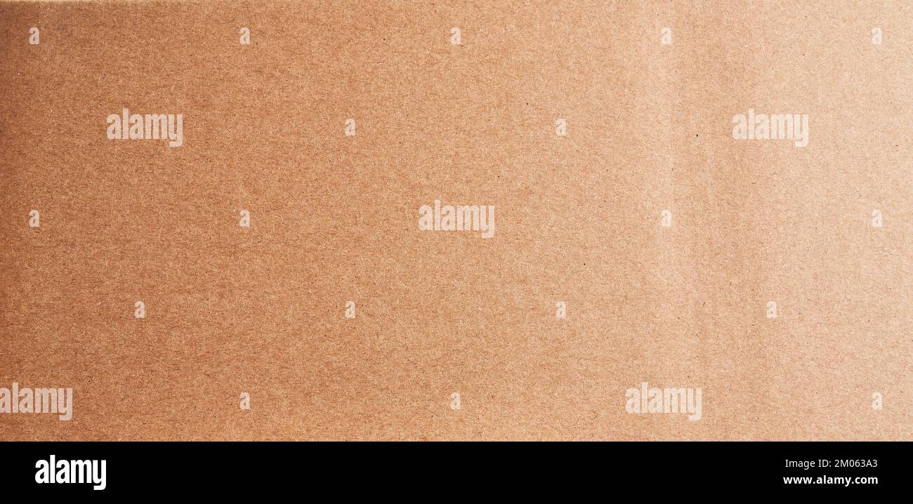 Brown cardboard carton material texture background Stock Photo - Alamy