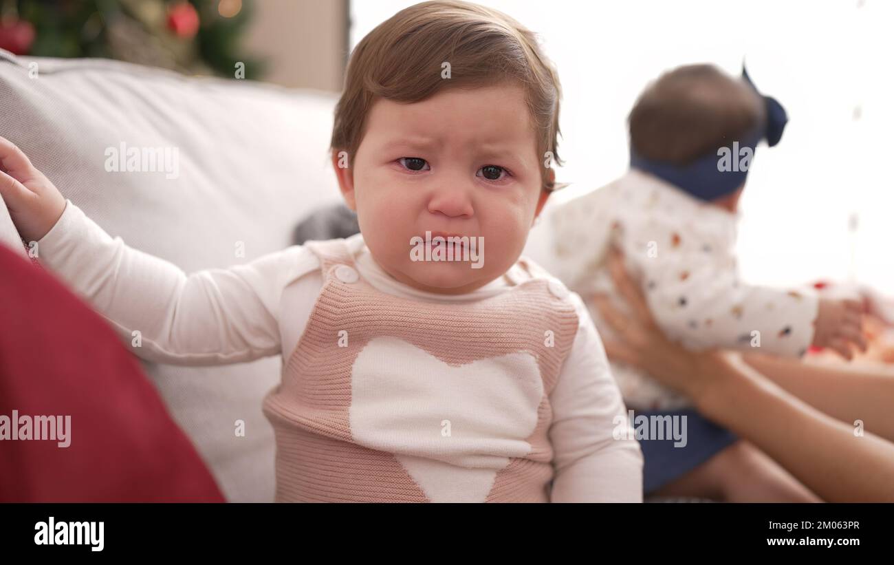 Child crying christmas tree hi-res stock photography and images - Alamy