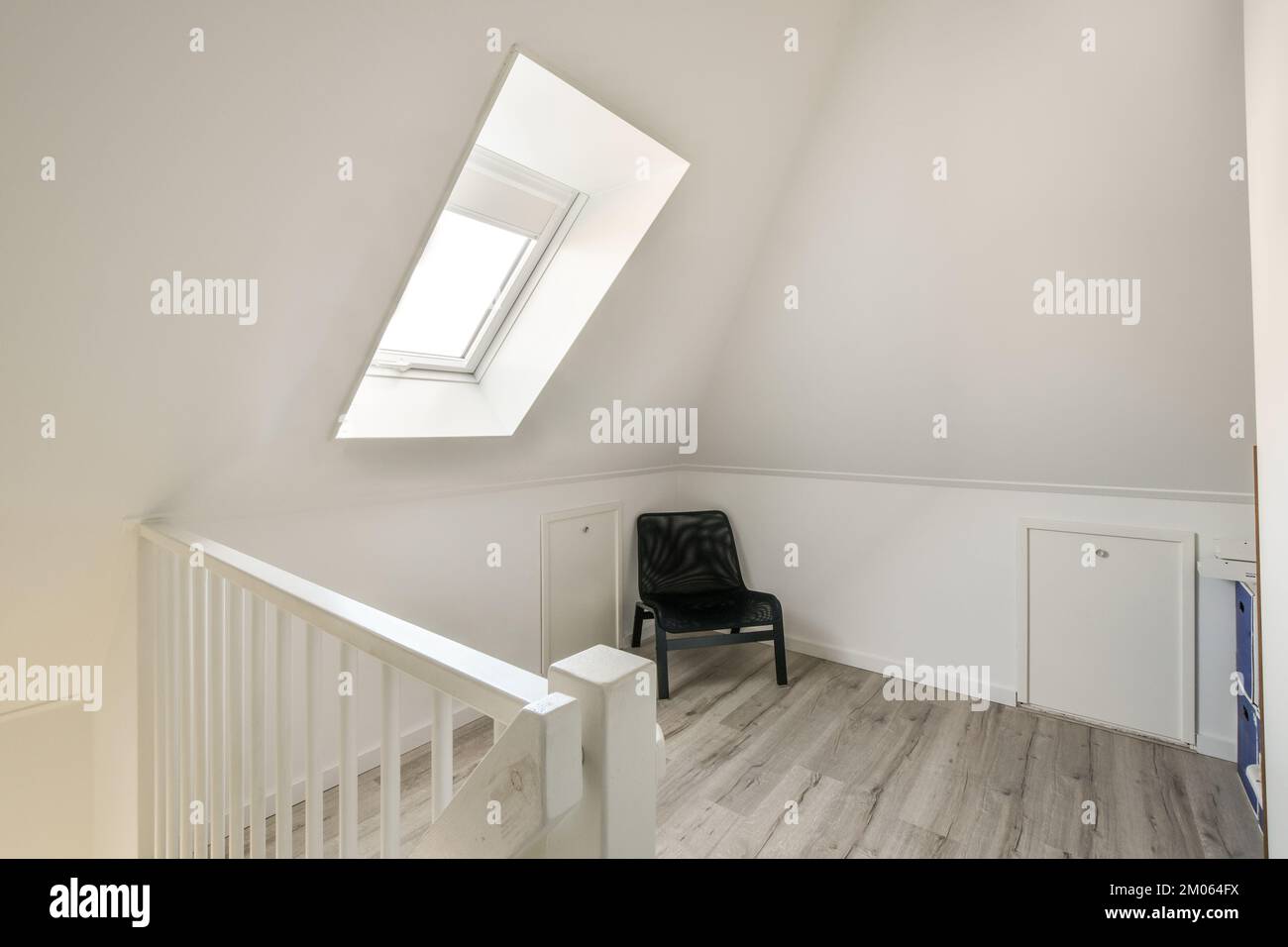 Small window of corridor located on top of staircase in modern house ...