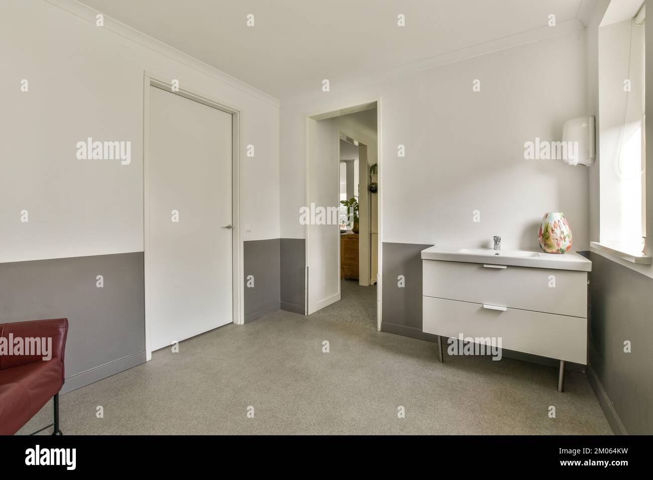 Spacious study room with table , armchair and cupboard with balcony ...