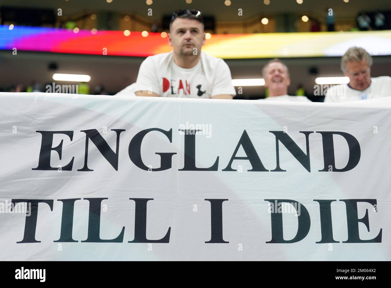 An England fan with an 'England till I Die' banner ahead of the FIFA ...