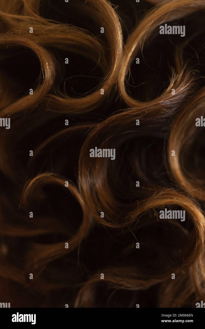 hair curly brown hair as background Stock Photo - Alamy