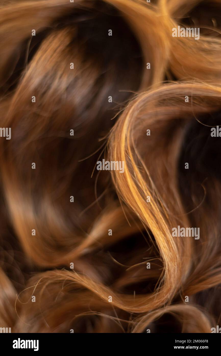 hair curly brown hair as background Stock Photo - Alamy