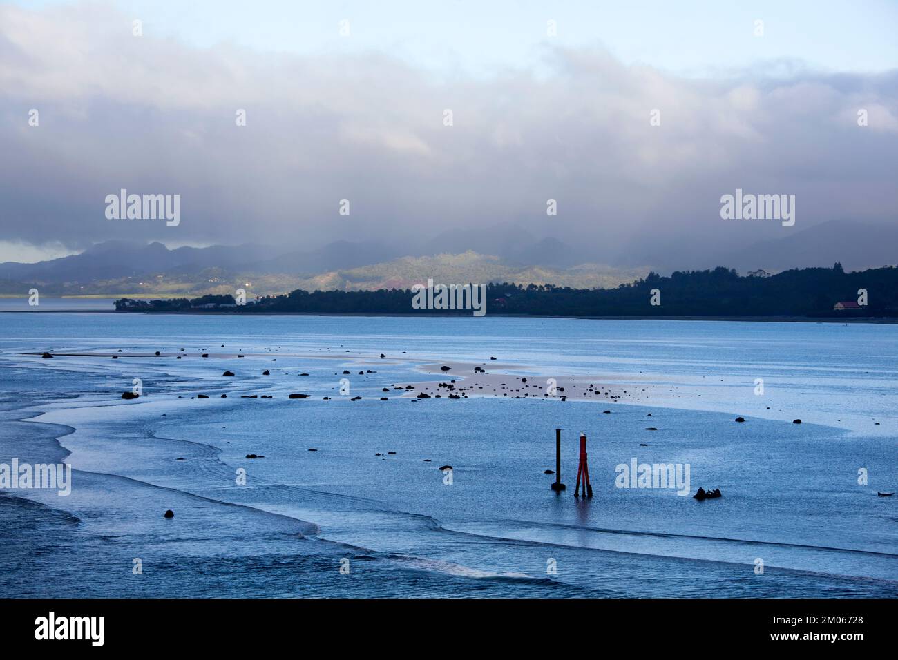 The view of a rainy sky over Suva Harbour in Suva city, the capital of ...