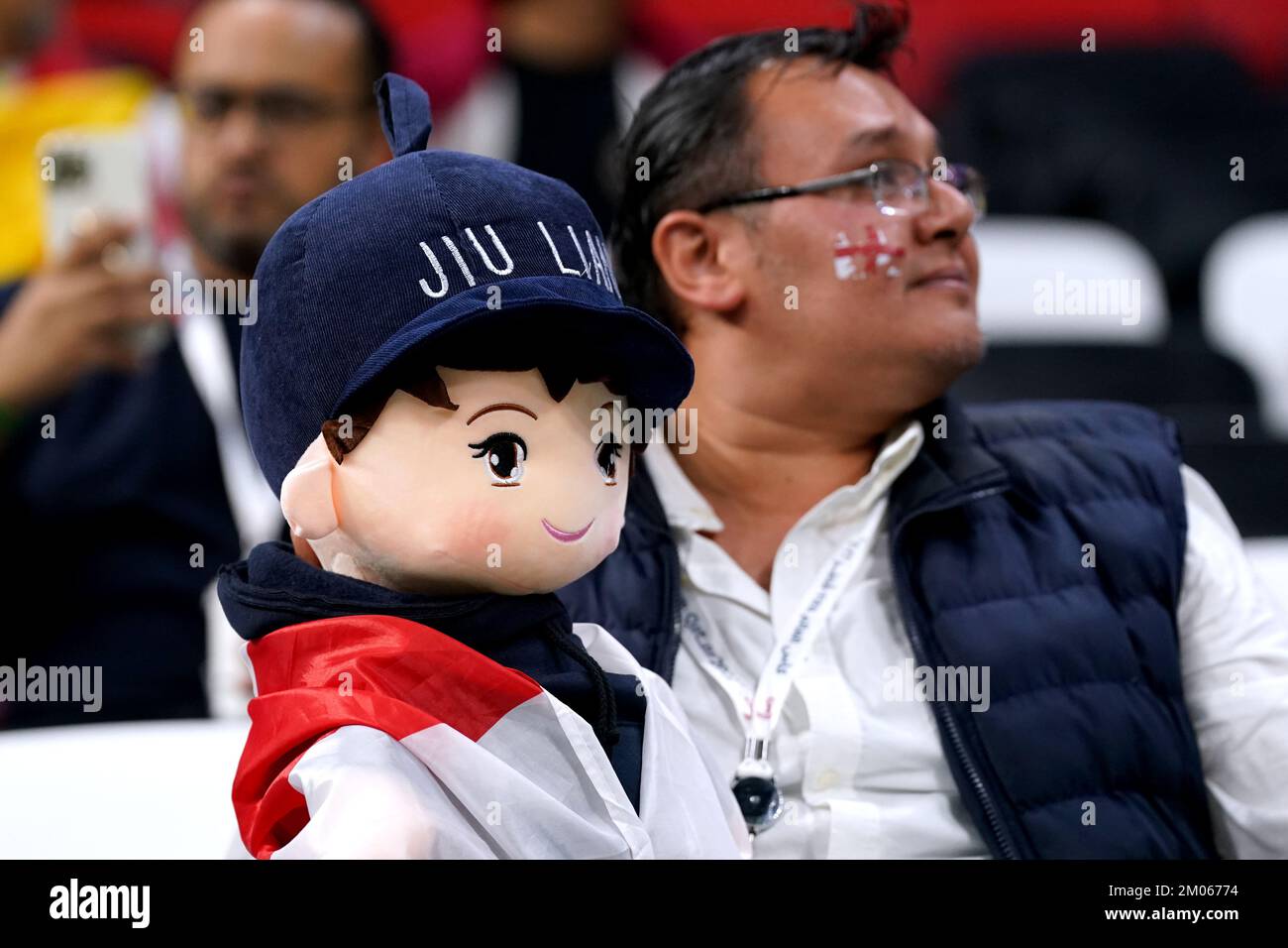 A England fan with a puppet dressed as a policeman during the FIFA ...