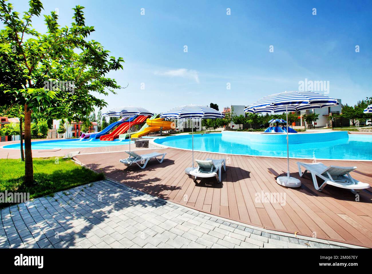 Water park slide and swimming pool in a luxury resort Stock Photo - Alamy
