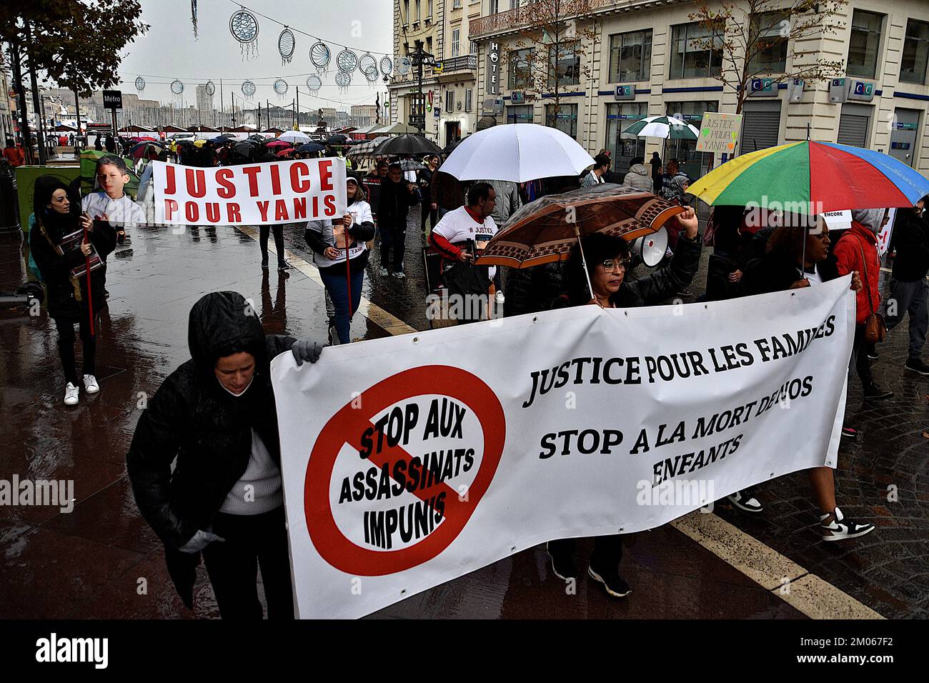 Protesters hold banners during the demonstration. People demonstrate in ...