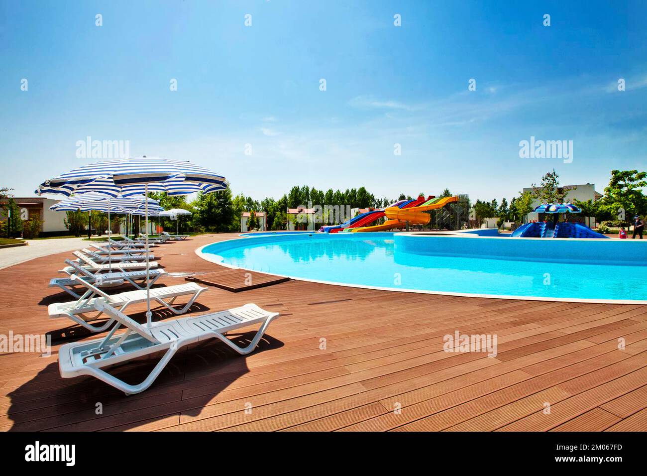 Water park slide and swimming pool in a luxury resort Stock Photo - Alamy