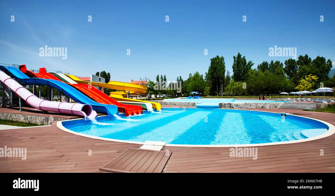 Water park slide and swimming pool in a luxury resort Stock Photo - Alamy