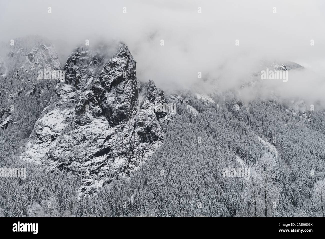 Snow on the rock face of Mount Si in the Washington Cascade Mountains ...