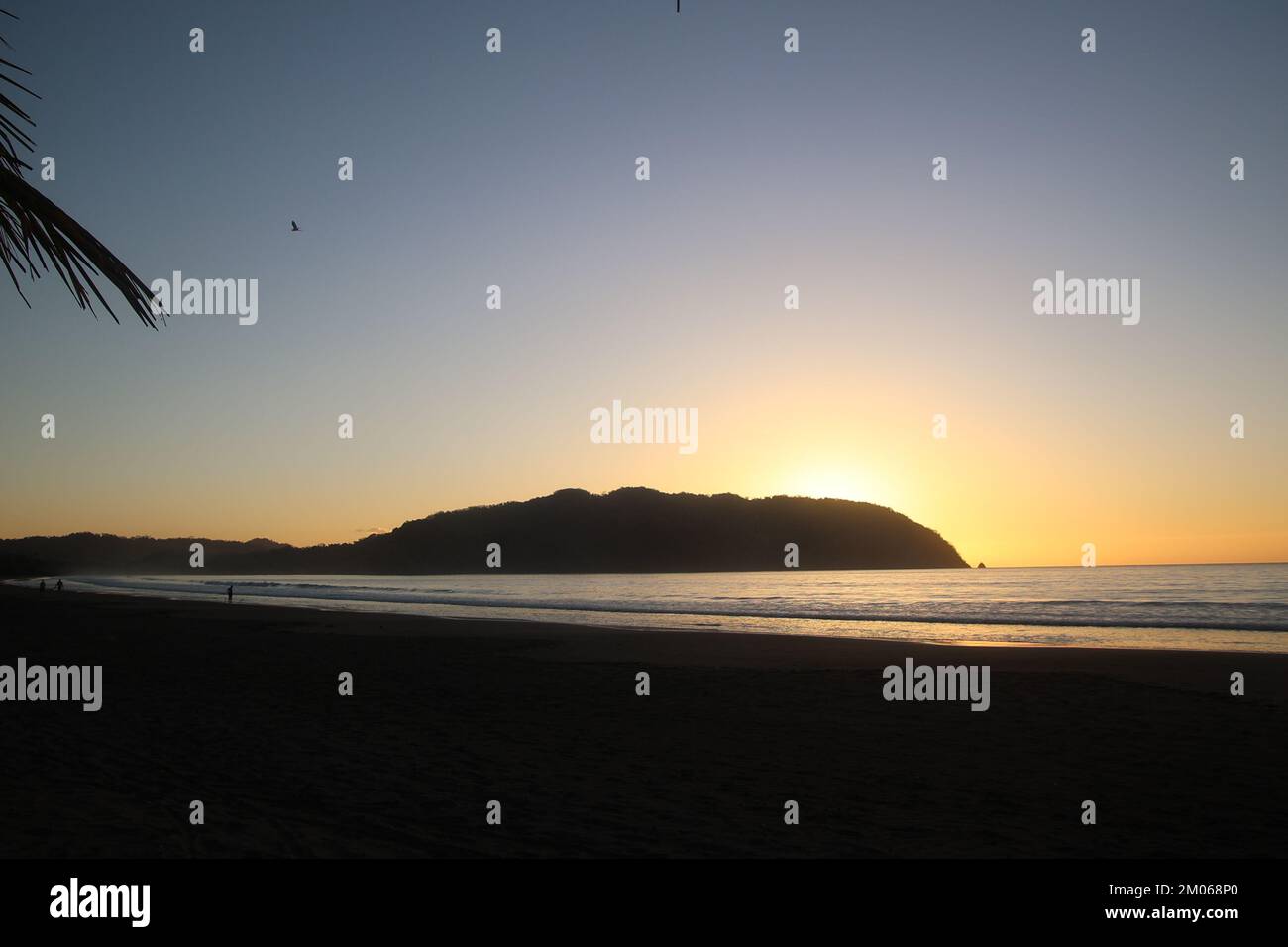 Flying over rock mountain beach hi-res stock photography and images - Alamy
