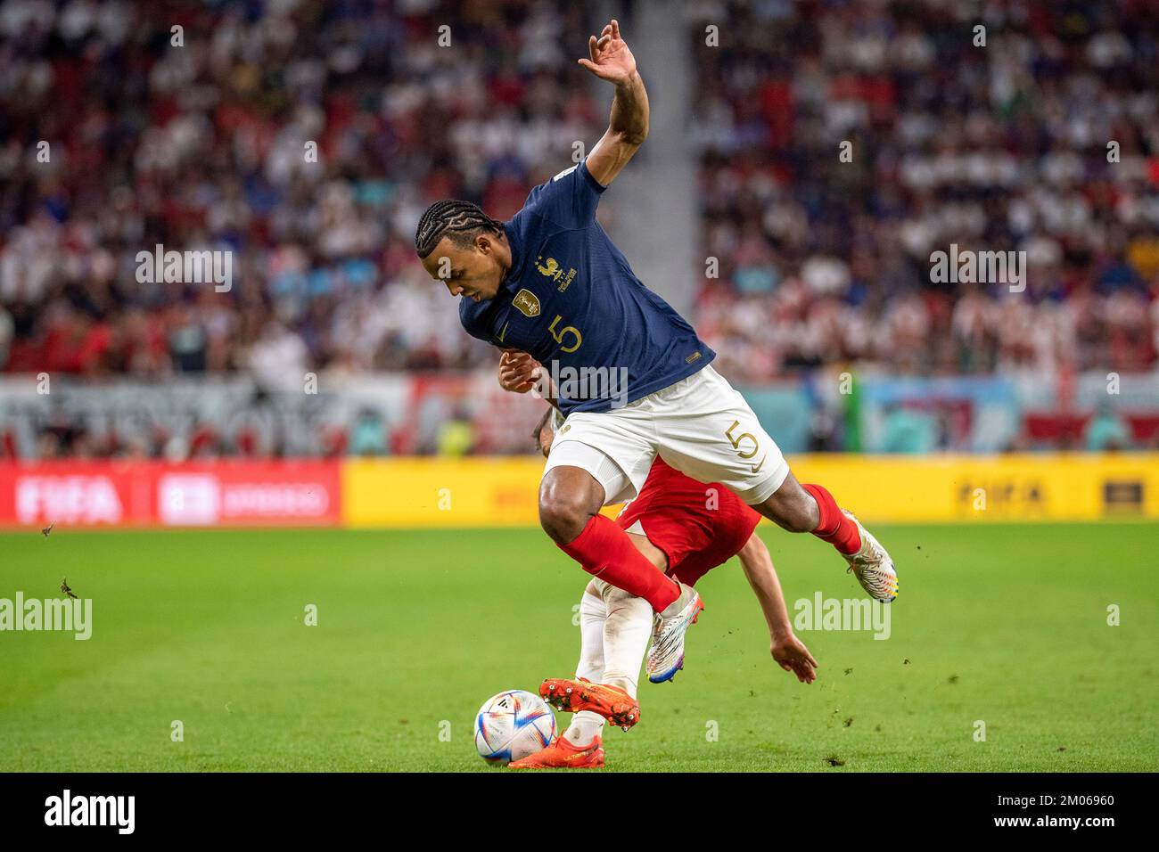 Doha, Qatar. 04th Dec, 2022. Przemyslaw Frankowski of Poland and Jules ...