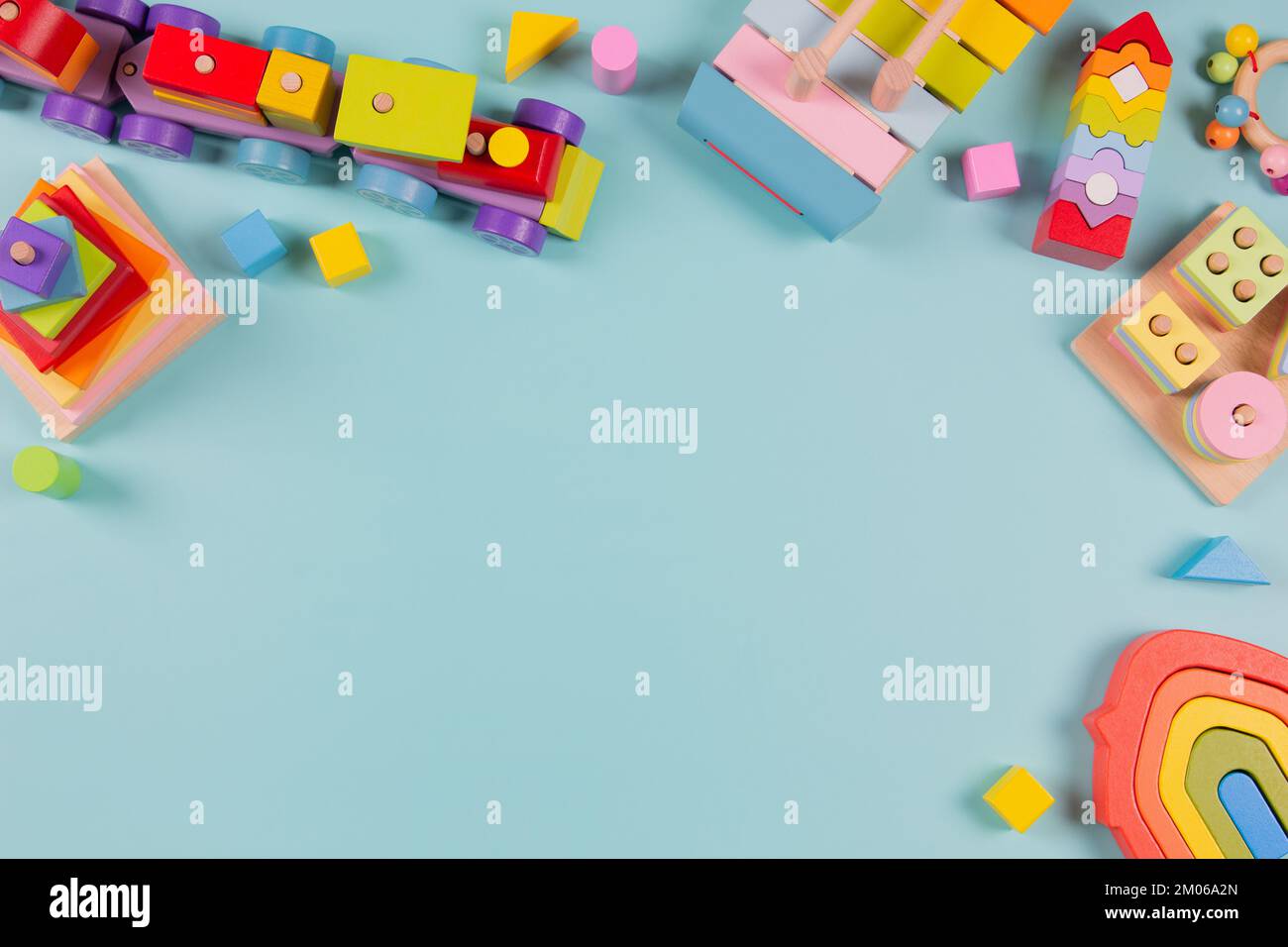 Baby kids toys background. Wooden train, colorful sustainable ...