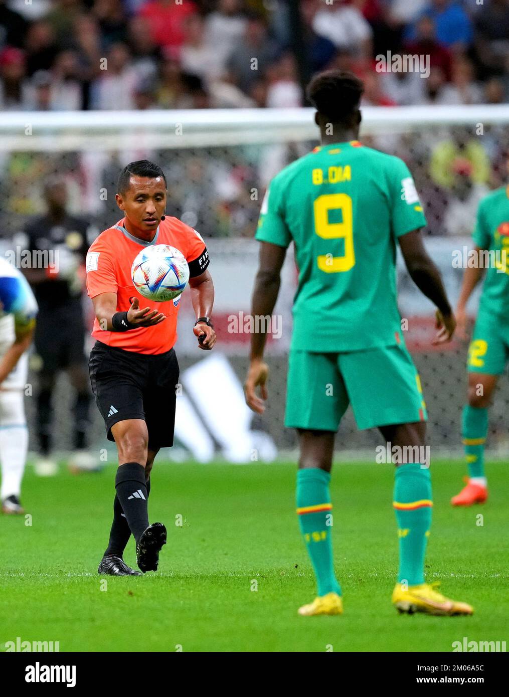 Referee Ivan Arcides Barton Cisneros changes the ball during the FIFA ...