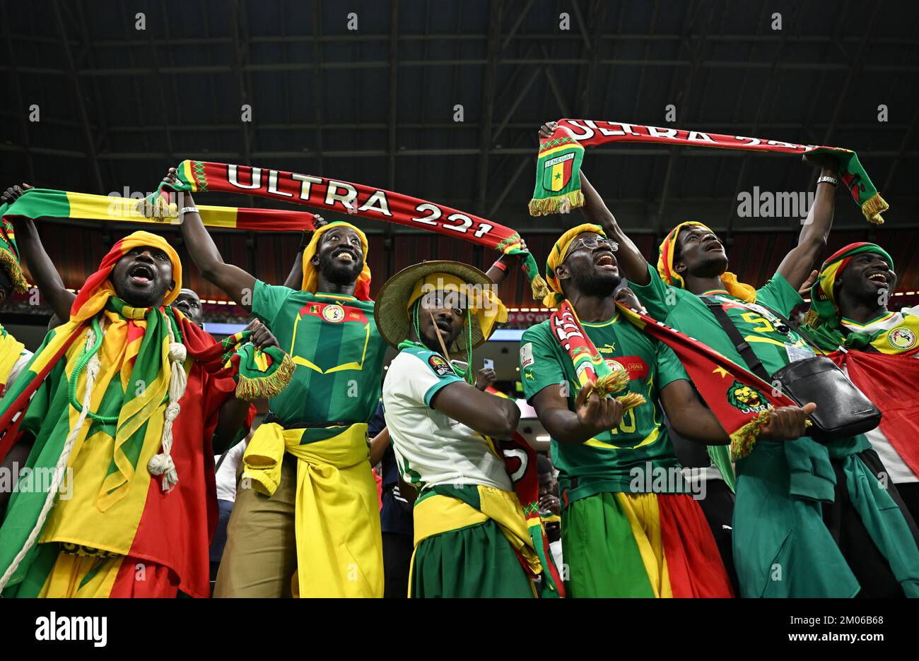 Al Khor, Qatar. 4th Dec, 2022. Fans of Senegal cheer prior to the Round ...