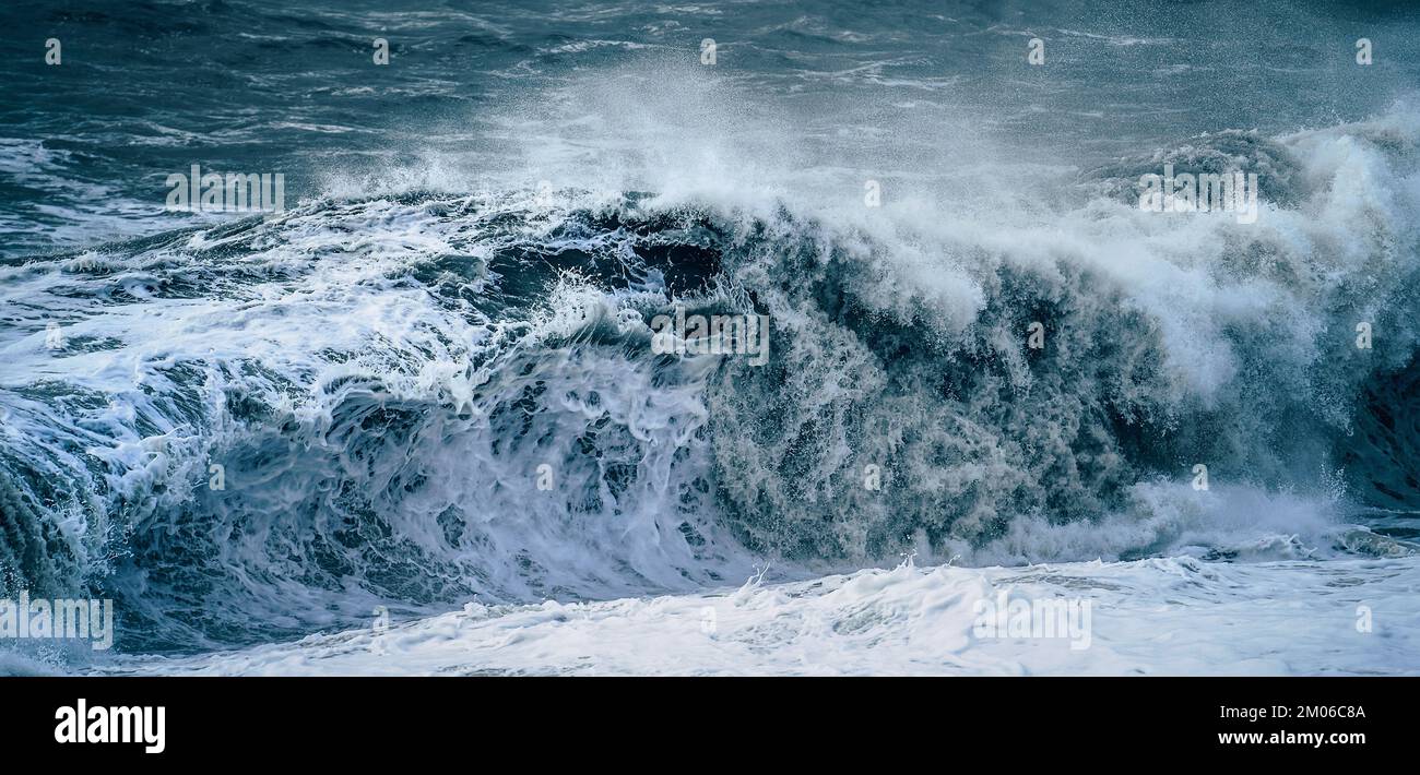 Dark blue dramatic sea storm. Ocean water bubbling near coast shore ...