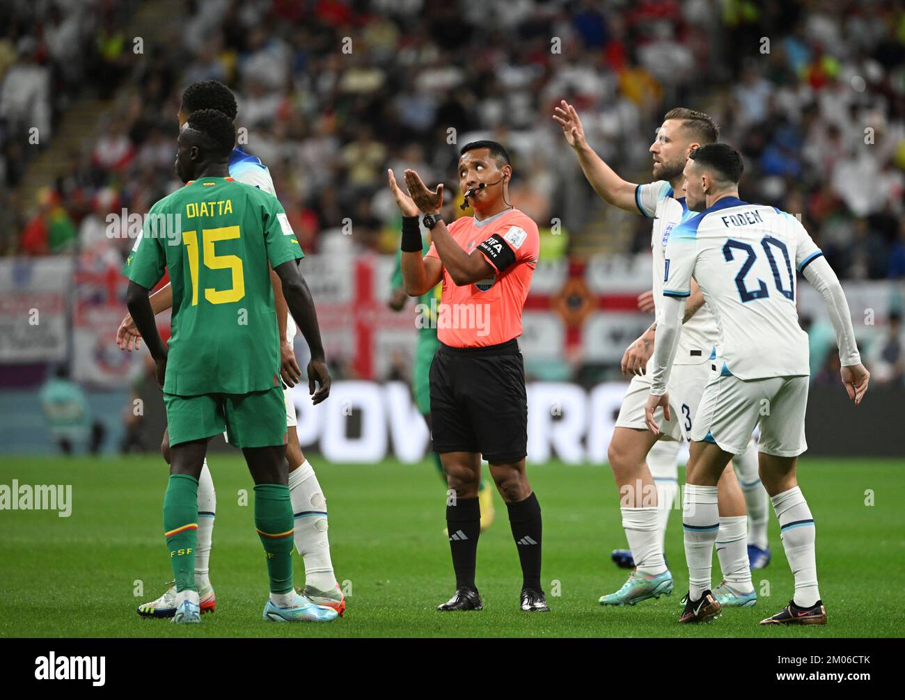 Al Khor, Qatar. 4th Dec, 2022. Referee Ivan Barton (C) gestures during ...
