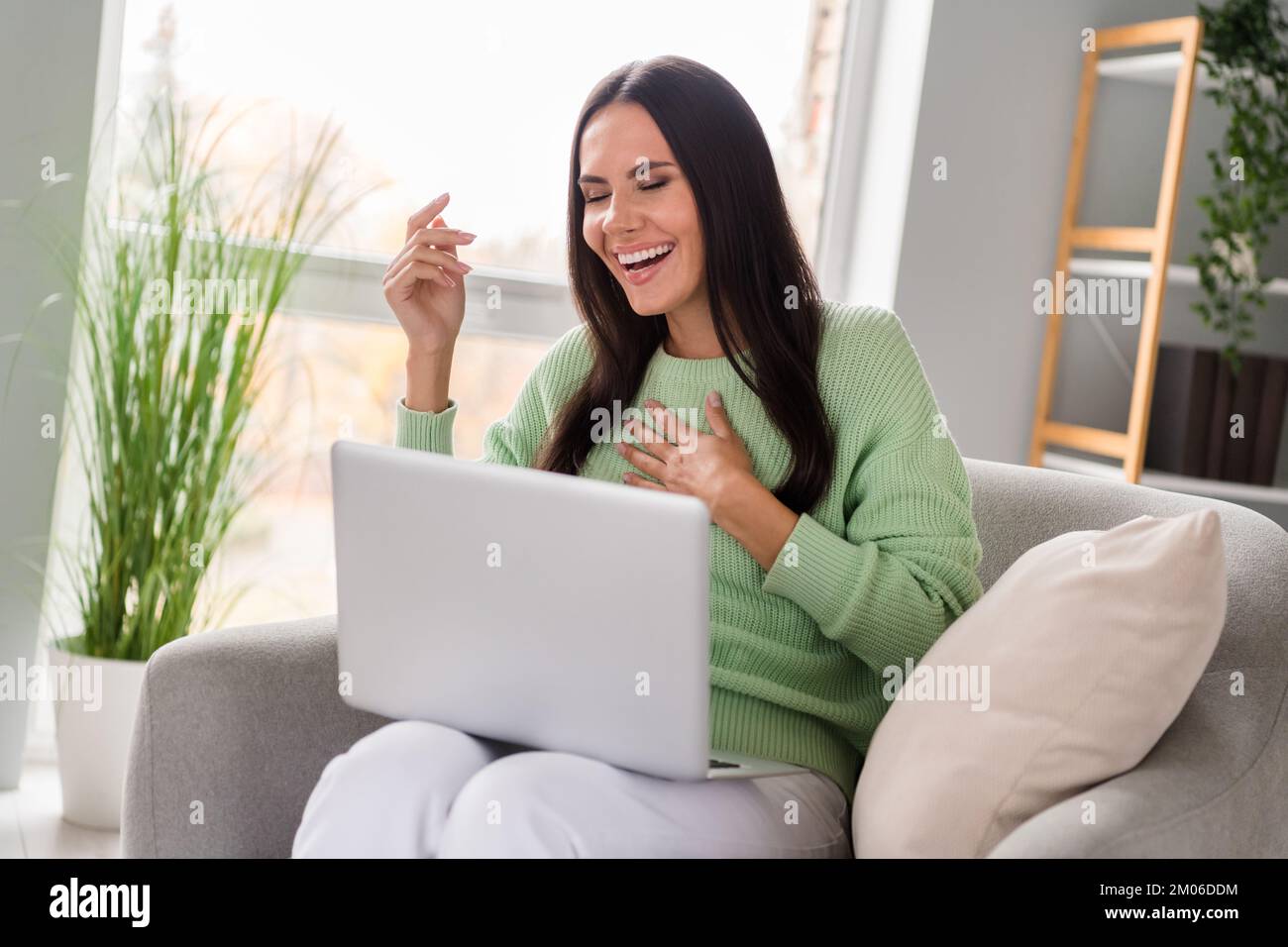 Photo of cheerful positive lady use blogger speaking friends followers ...
